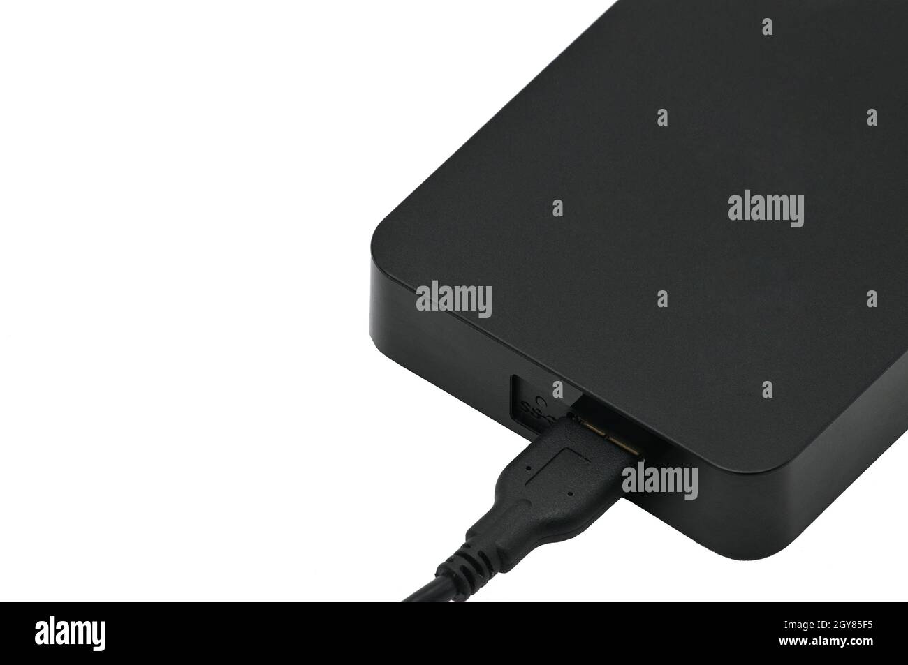 Portable hard drive for backing up various files on an isolated white ...