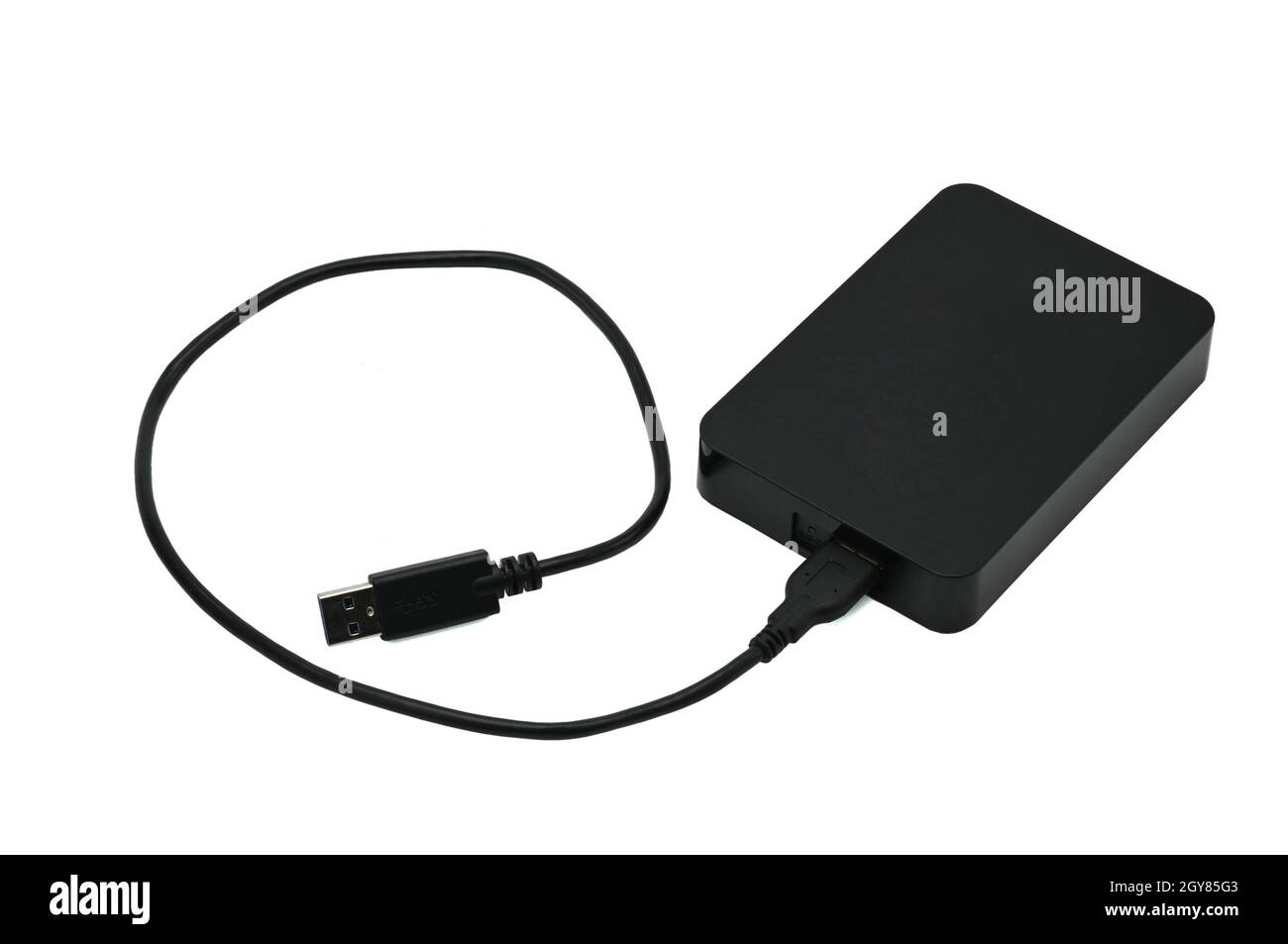 Portable hard drive for backing up various files on an isolated white ...