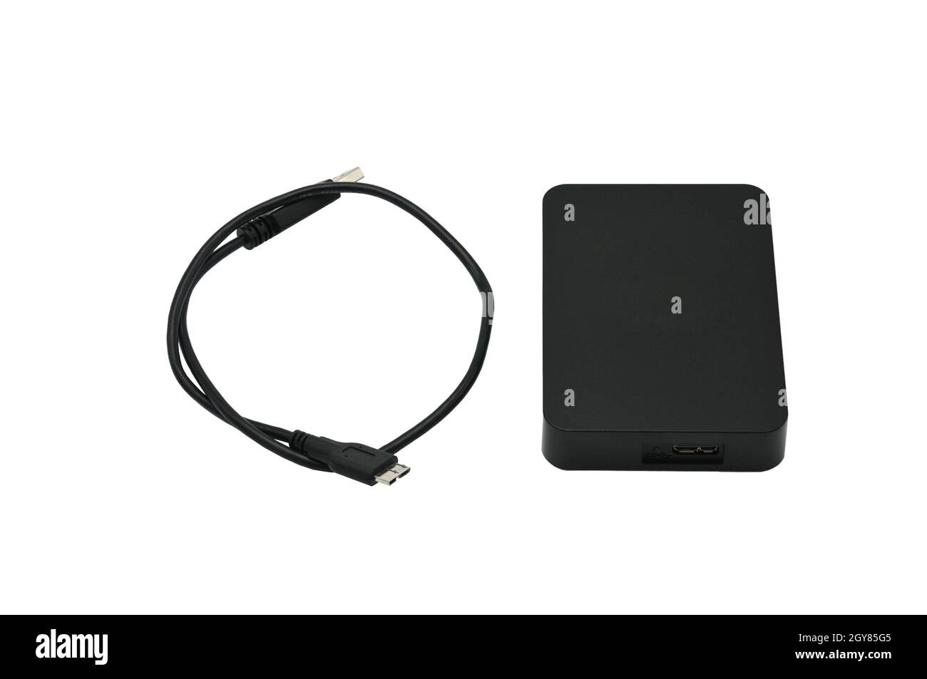 Portable hard drive for backing up various files on an isolated white ...