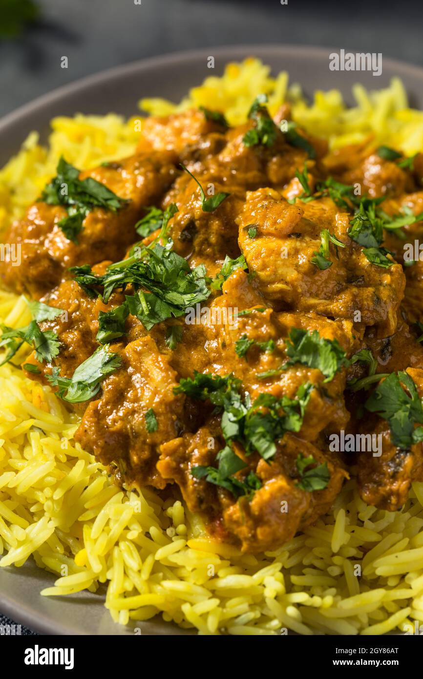 Homemade Indian Chicken Biryani with Yellow Rice Stock Photo - Alamy