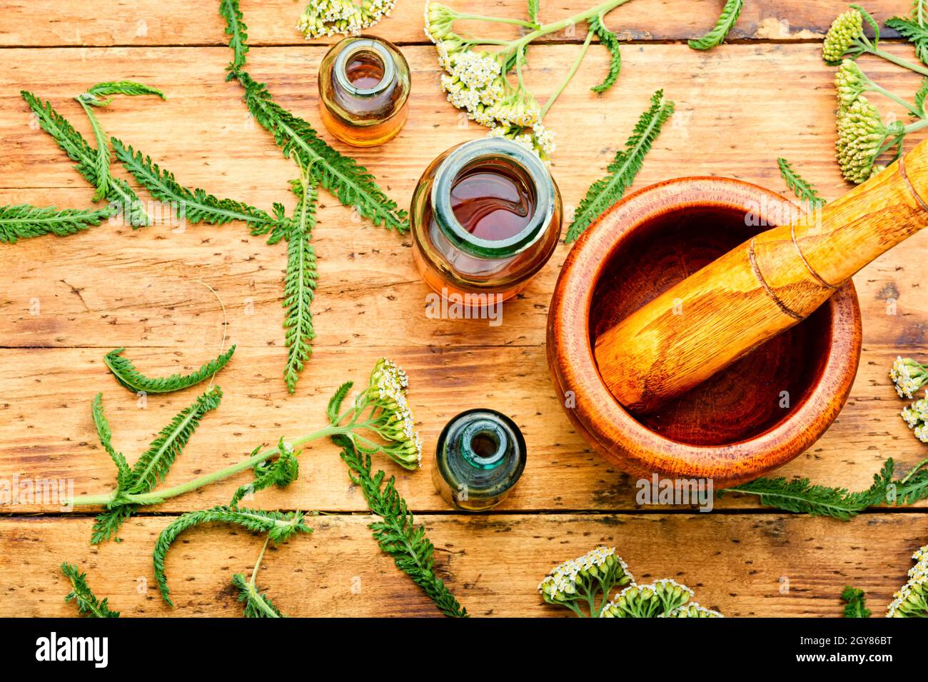 Jar of yarrow tincture.Medicine made from healing herbs.Alternative ...