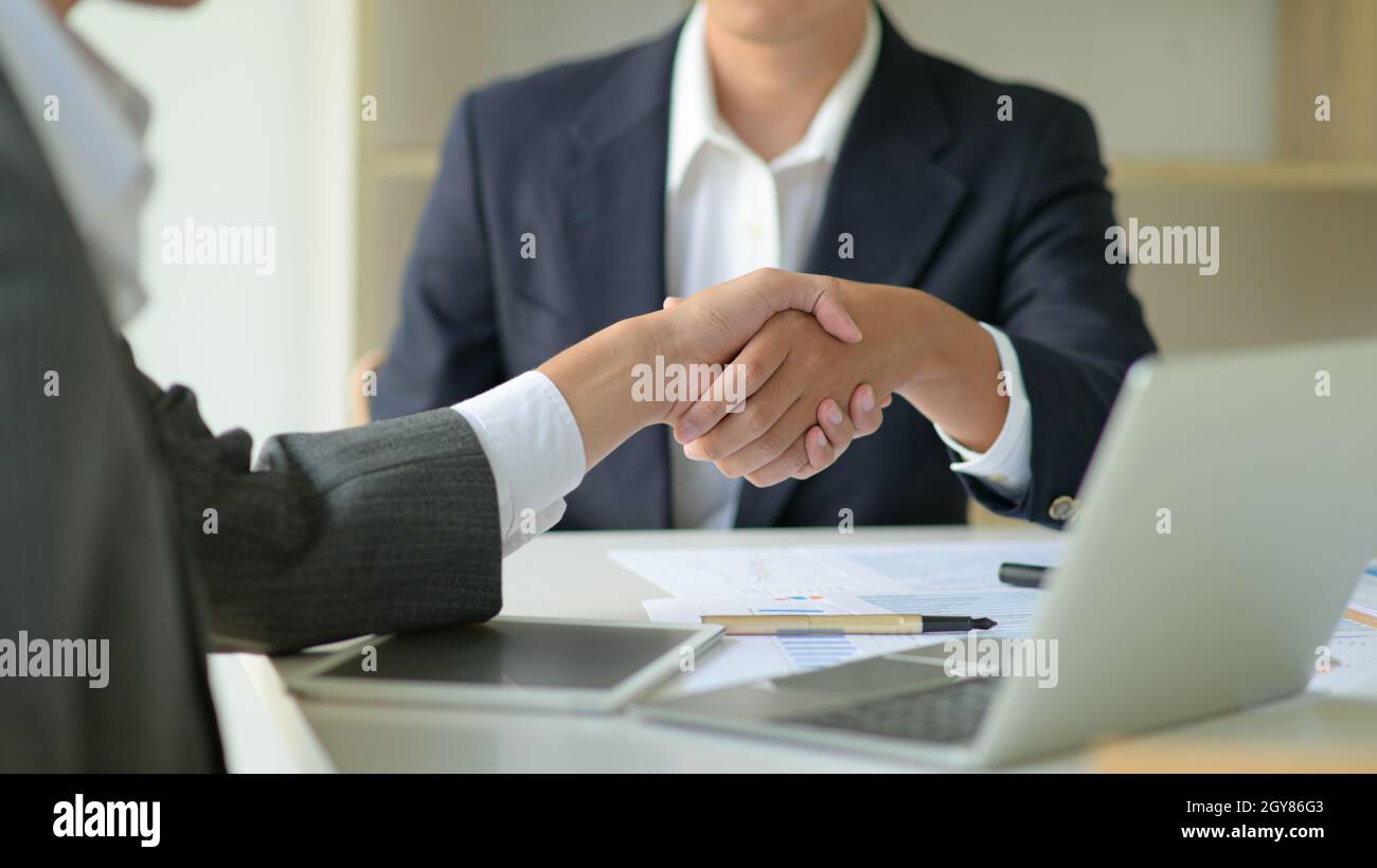 Business people shake hands to work Stock Photo - Alamy