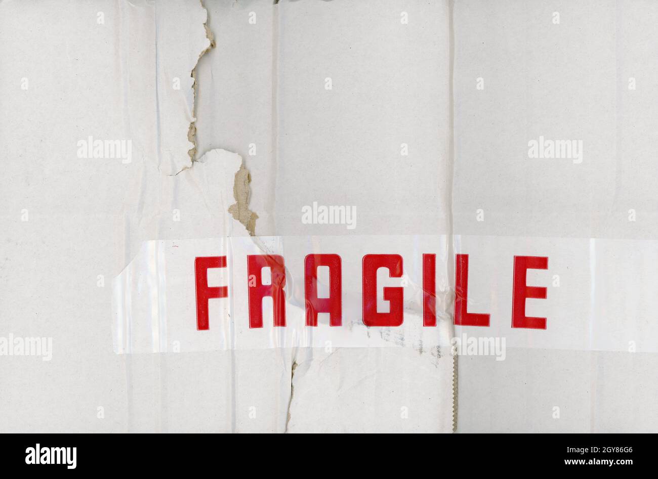 fragile label on a cardboard packet box Stock Photo - Alamy