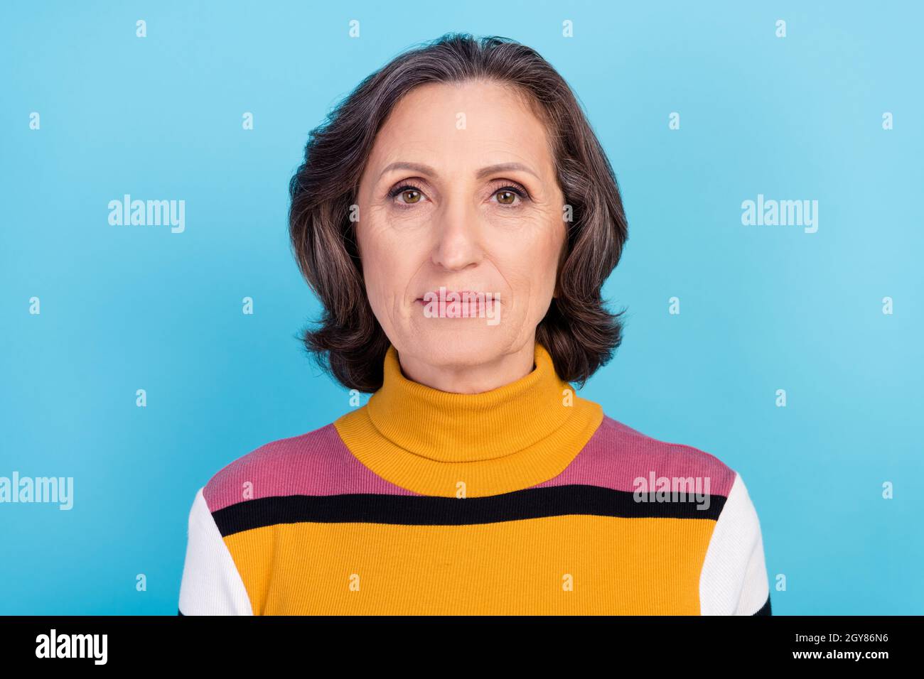 Photo of nice grey hairdo old lady wear striped sweater isolated on ...