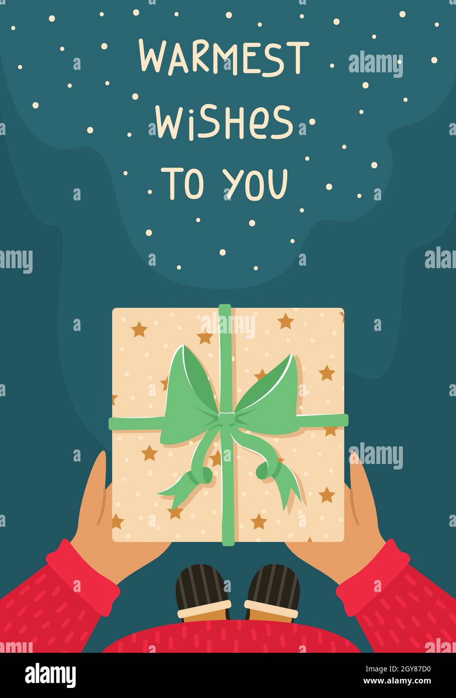 A man in pajamas and slippers holds a Christmas gift in his hands. New ...