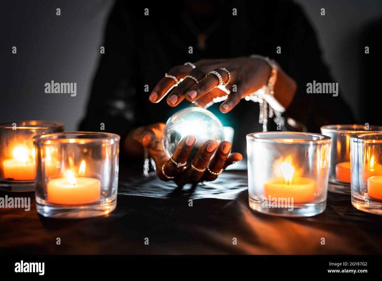 Fortune Teller Predicting Future Using Crystal Ball Stock Photo - Alamy