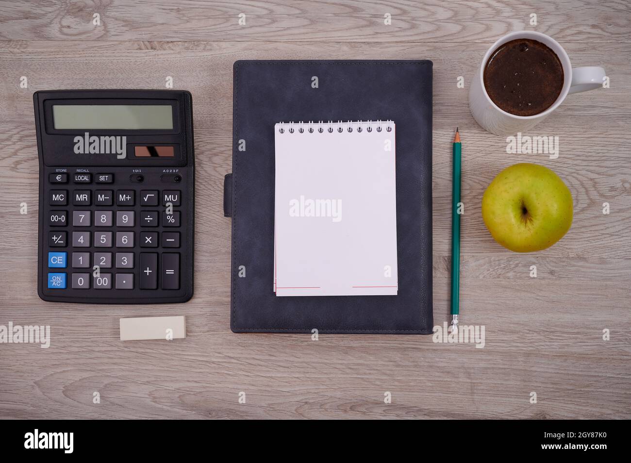 Blank Notebook Page With A Calculator And Geometric Stationery Over ...