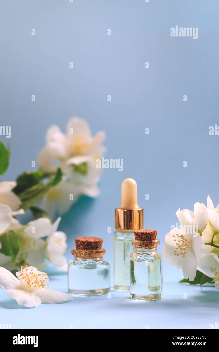 Tender Jasmine Flowers And Oil Small Bottle With Cosmetic Cleansing Aroma Oil And White
