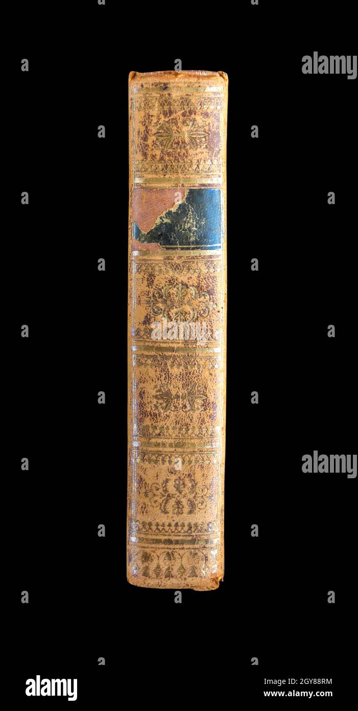 Old vintage book spine isolated on black background Stock Photo - Alamy