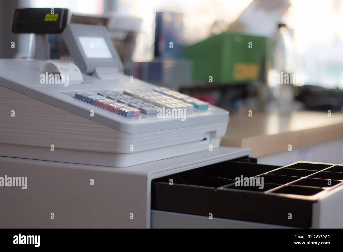 Cash register in a shop: Customer is paying purchase Stock Photo - Alamy