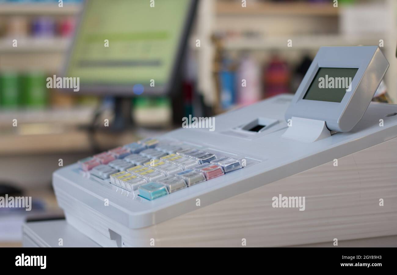 Cash register in a shop: Customer is paying purchase Stock Photo - Alamy