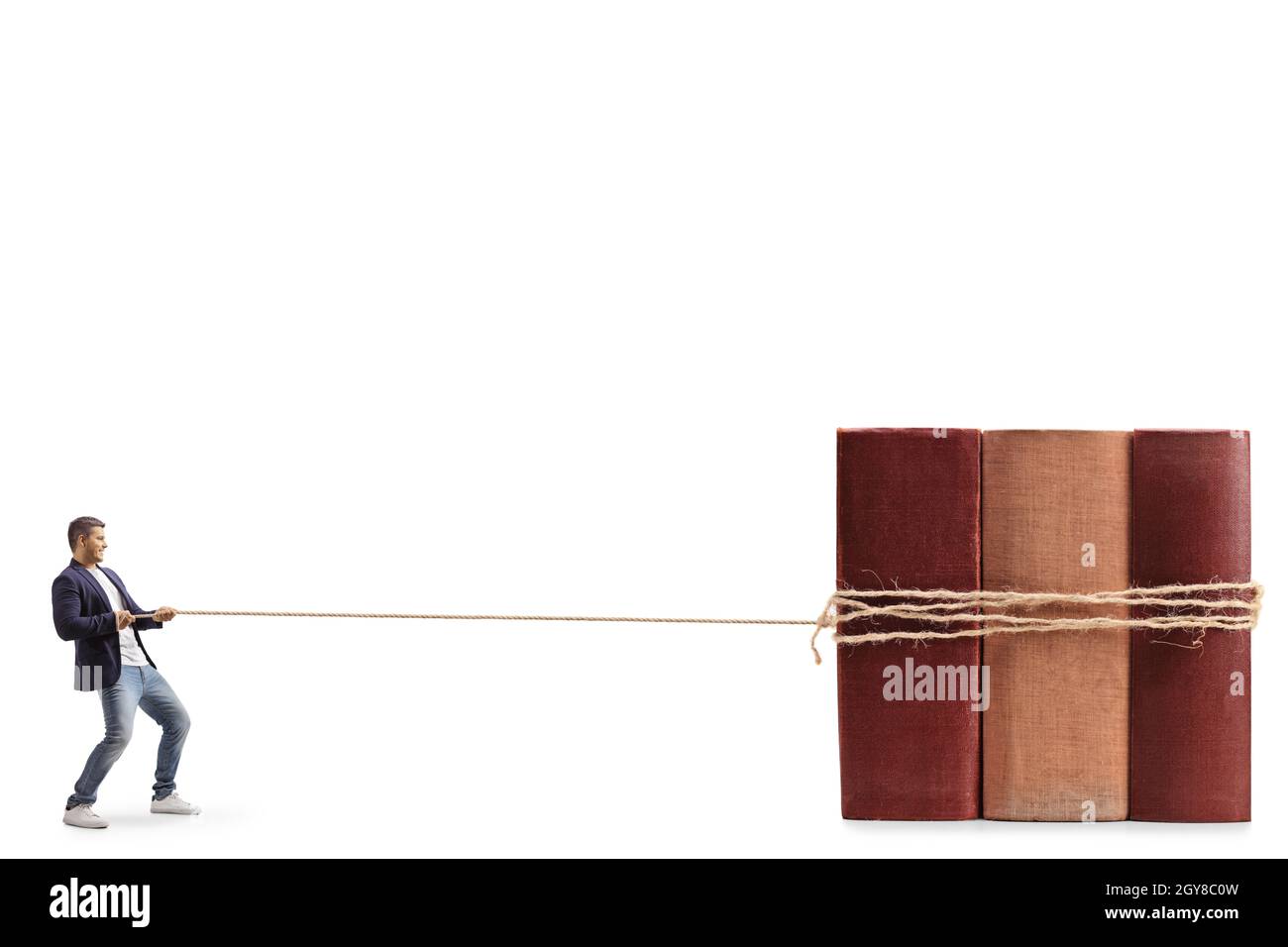 Full length profile shot of a guy pulling books with a rope isolated on ...