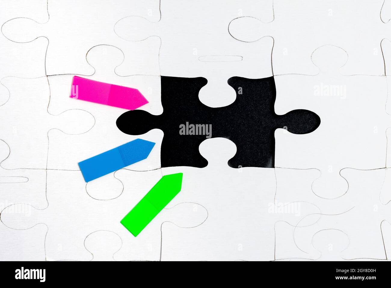 Building An Unfinished White Jigsaw Pattern Puzzle With Missing Last ...
