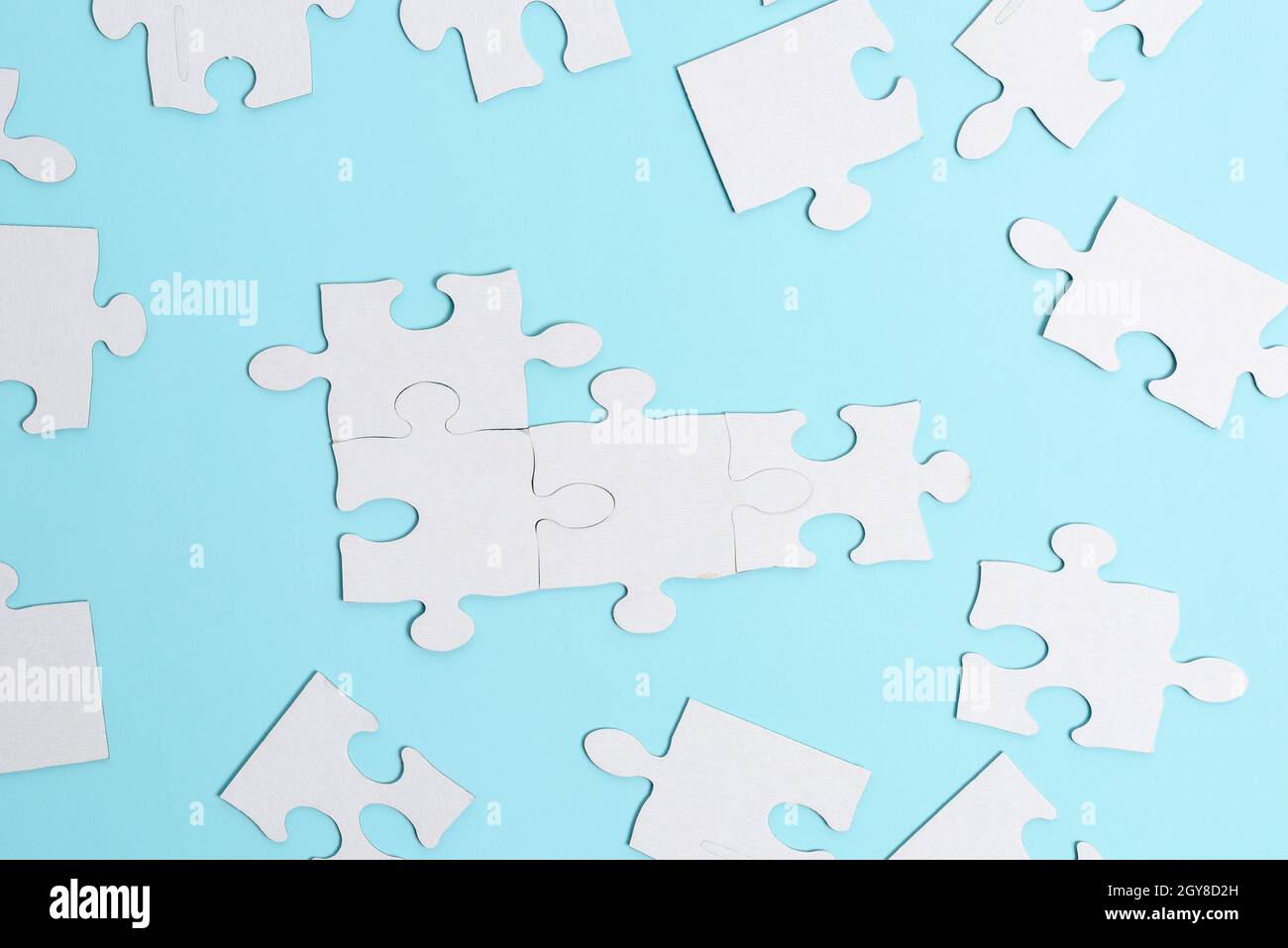 Building An Unfinished White Jigsaw Pattern Puzzle With Missing Last ...