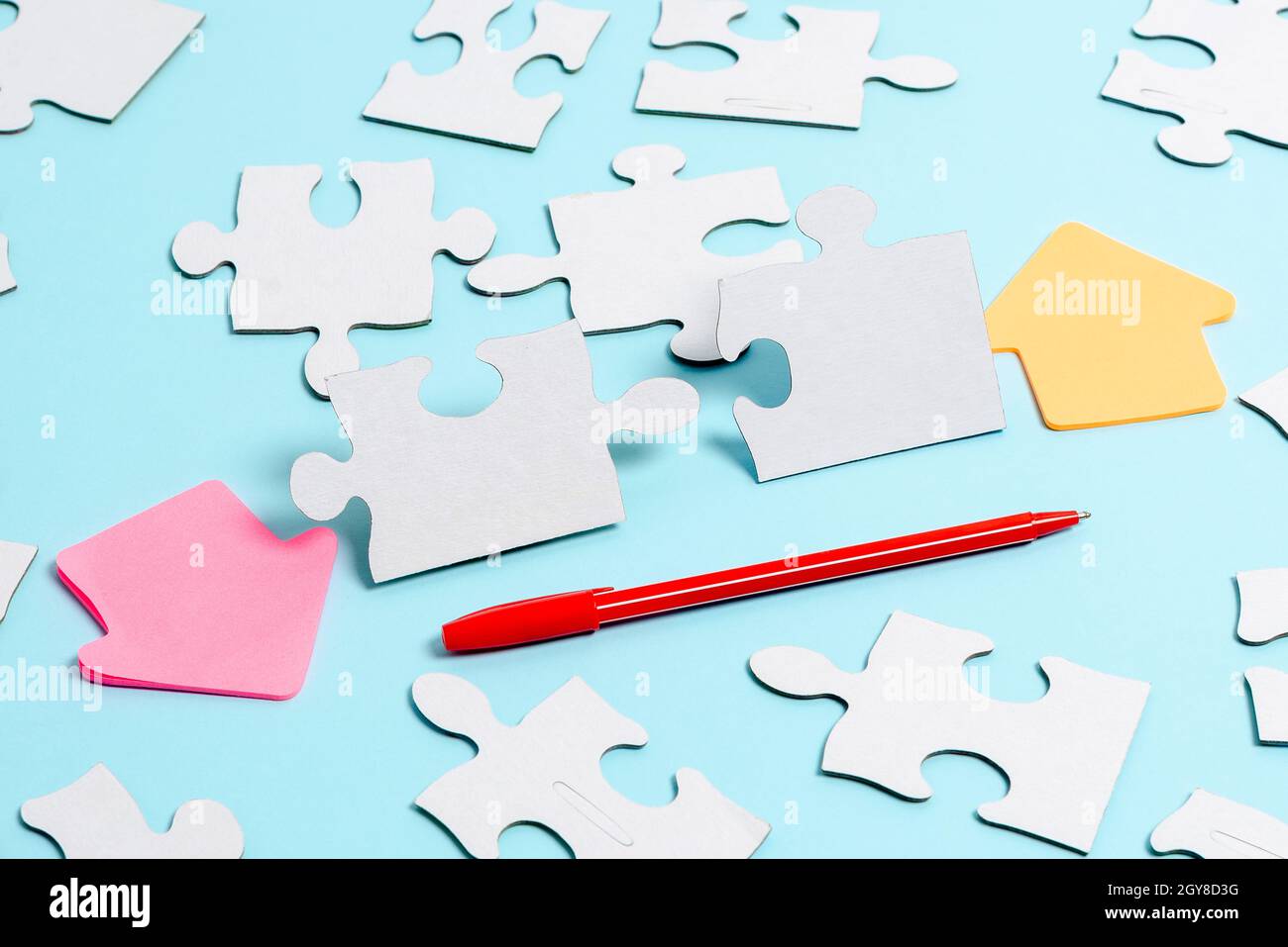 Building An Unfinished White Jigsaw Pattern Puzzle With Missing Last ...