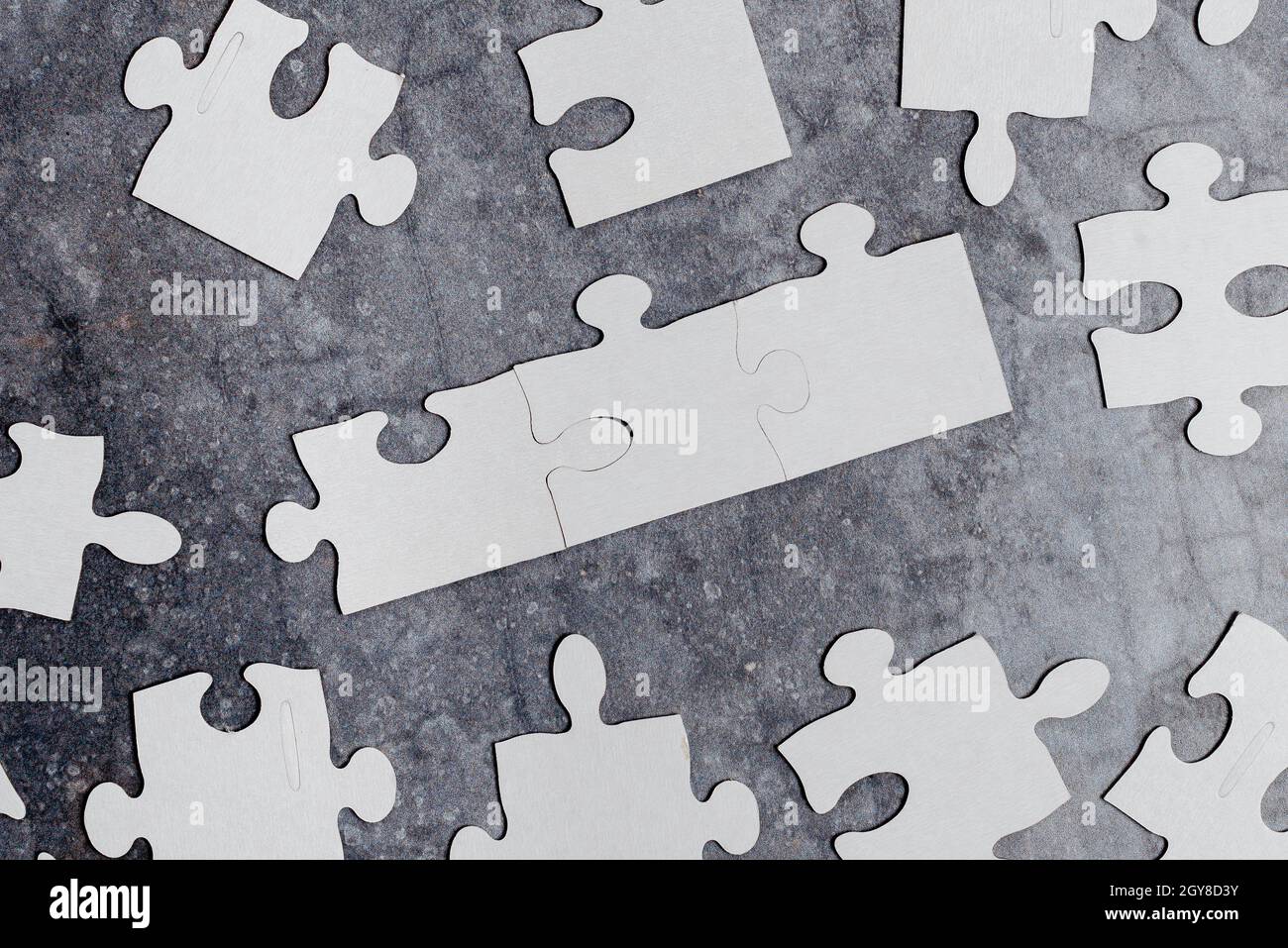 Building An Unfinished White Jigsaw Pattern Puzzle With Missing Last ...