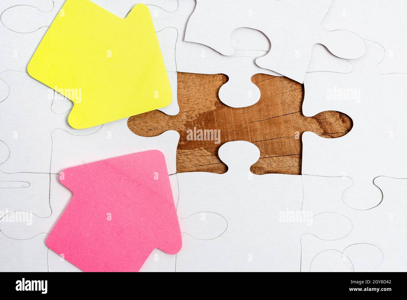 Building An Unfinished White Jigsaw Pattern Puzzle With Missing Last ...
