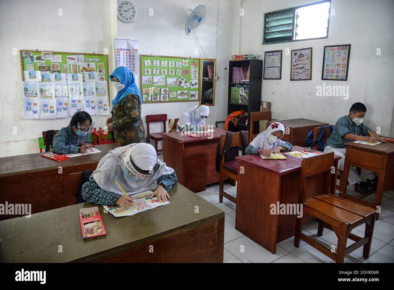 Students with disabilities take part a lesson in classroom, at a school ...