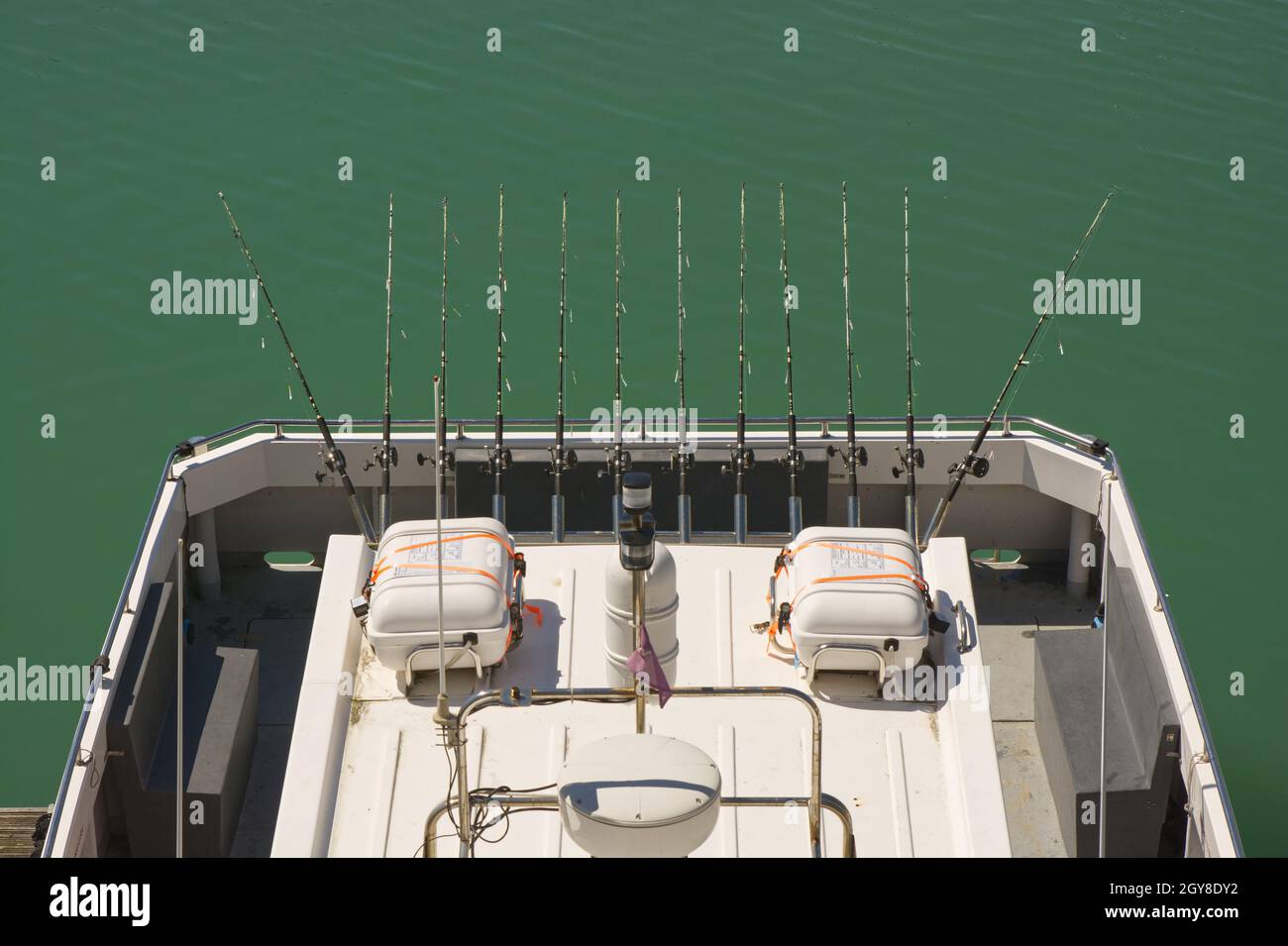 Fishing rods on stern of boat at Marina, Brighton, East Sussex, England ...