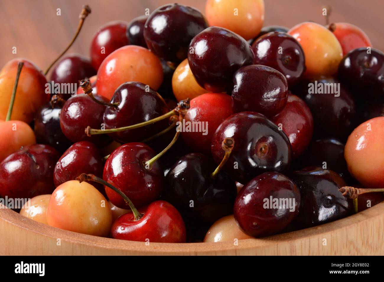 Yellow and red sweet cherries. Fresh ripe sour cherries Stock Photo - Alamy