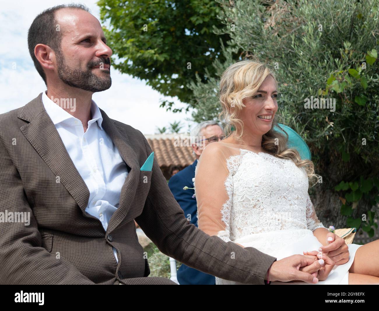 Happy Spanish couple during the wedding ceremony Stock Photo - Alamy