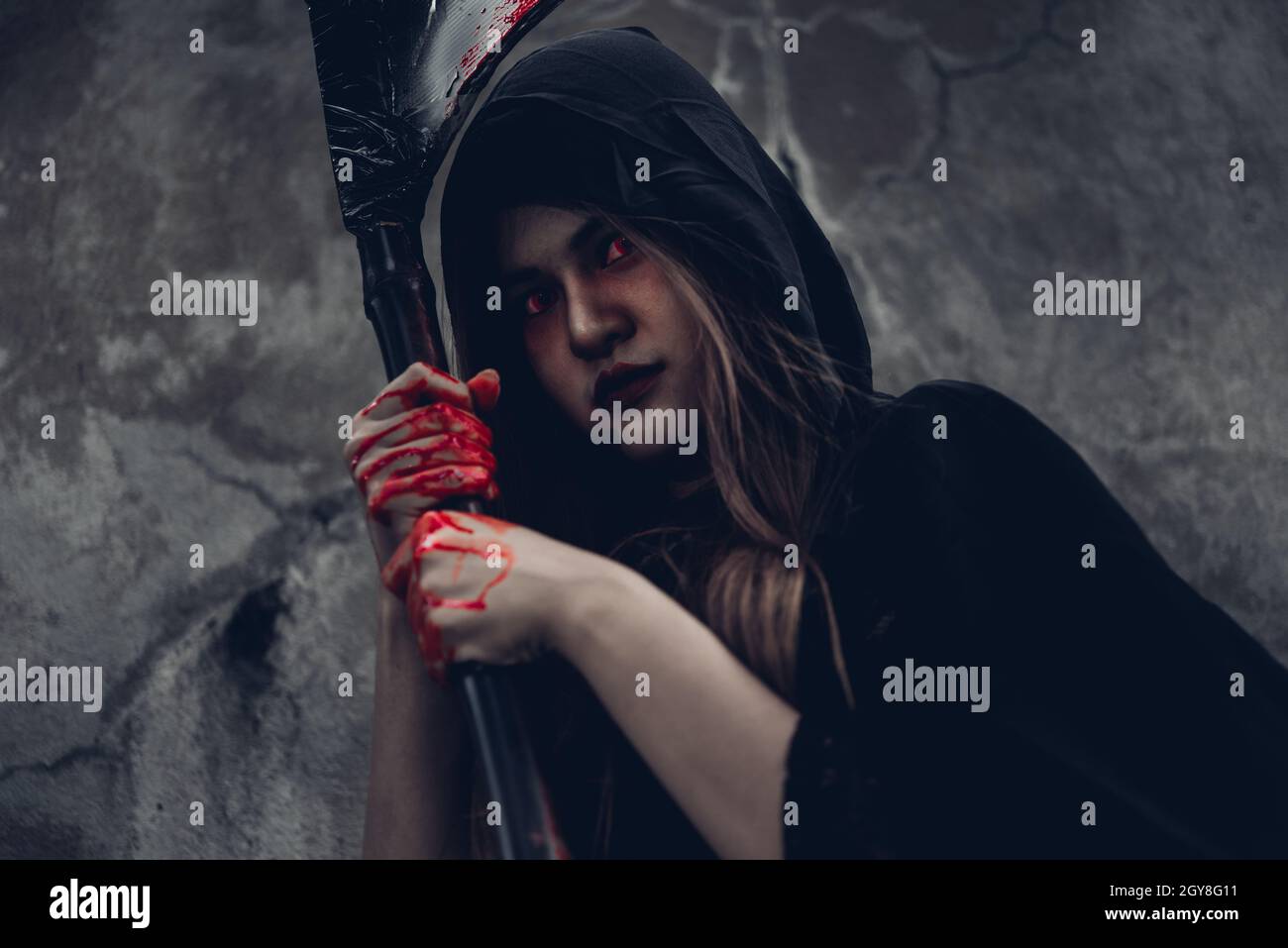 Woman ghost horror her have scythe on hand in forest, halloween day ...