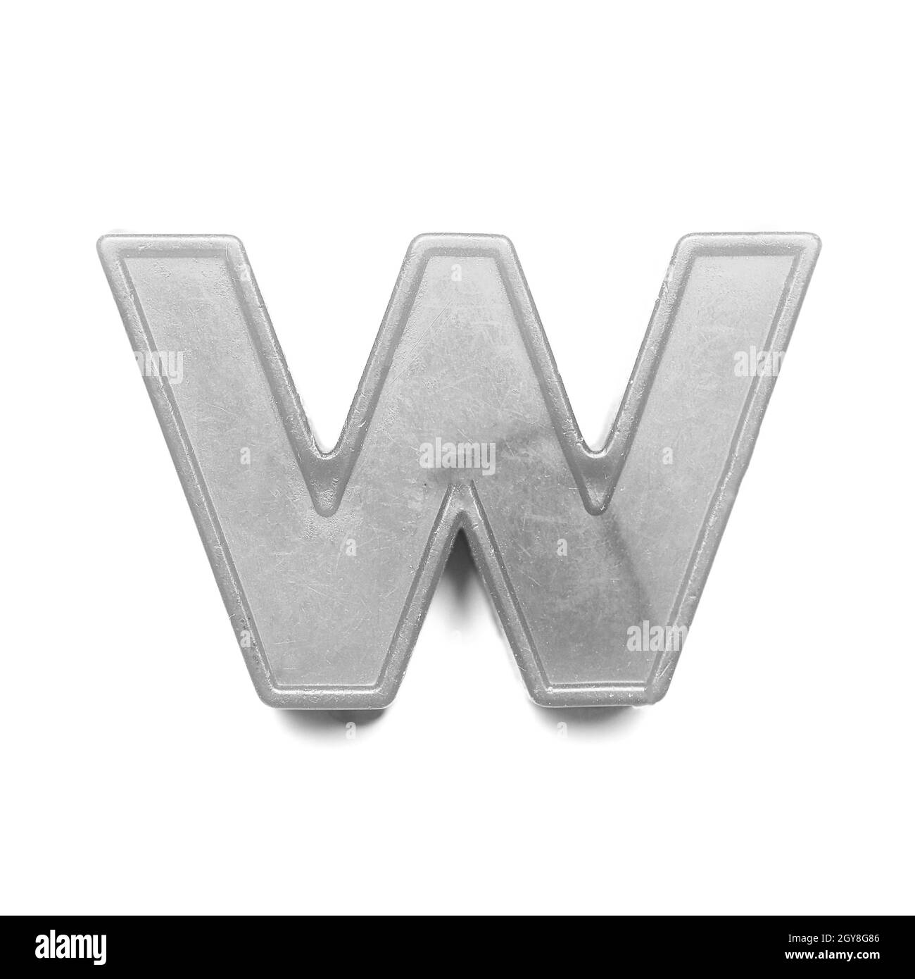Magnetic lowercase letter W of the British alphabet in black and white ...