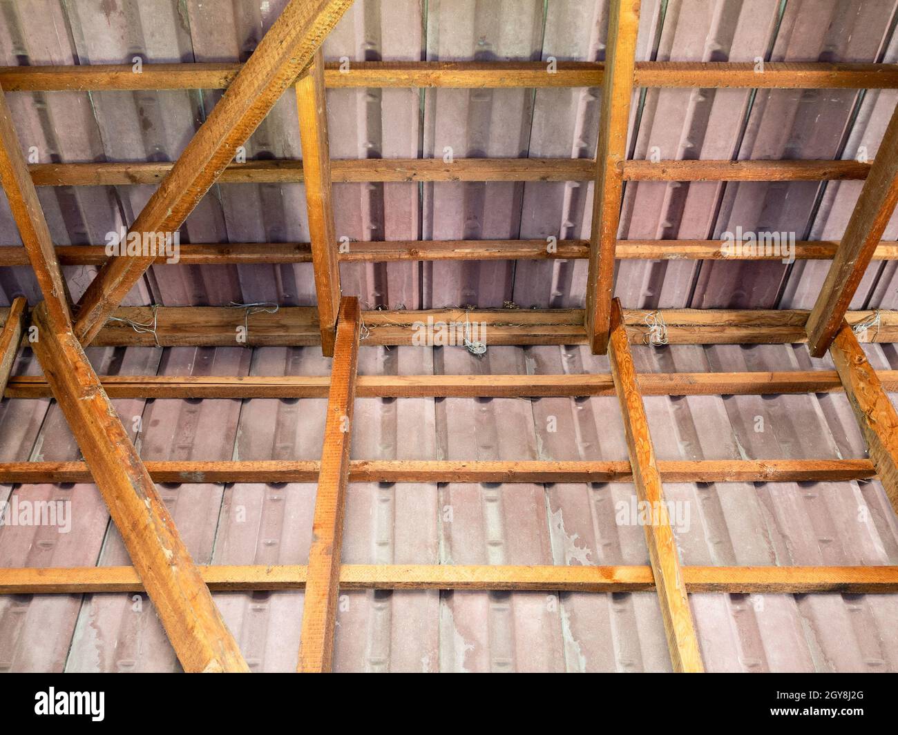 inside view of ceramic tile roof with wooden rafters and purlins Stock ...