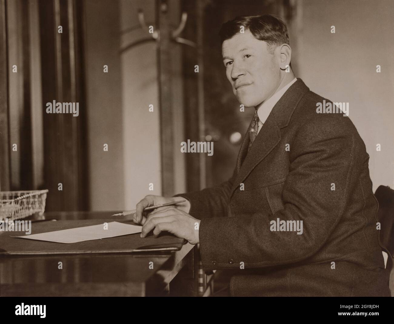 Jim Thorpe (1888-1953), Native American athlete, seated portrait ...