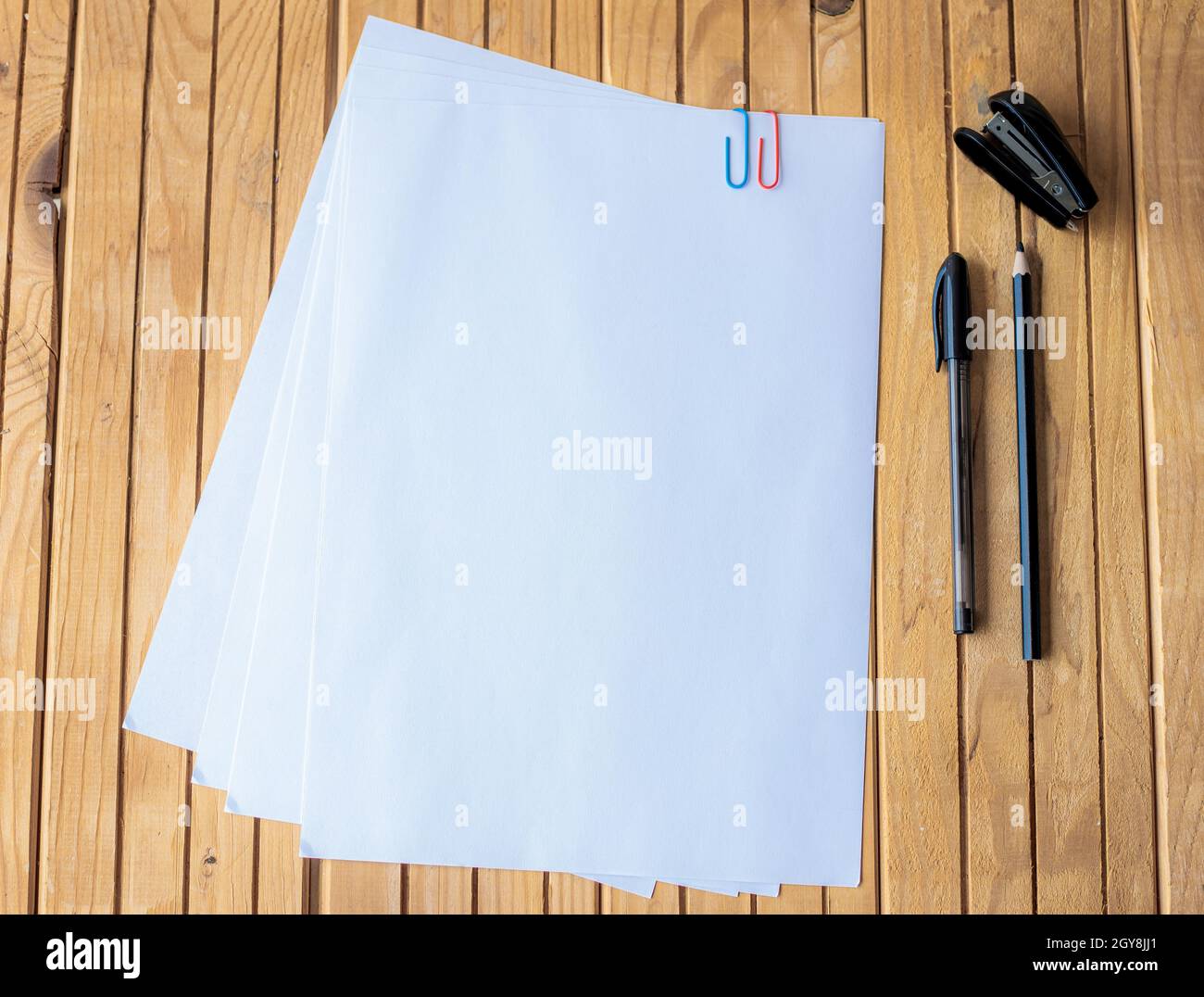 Office Stationery Paper Clipped Together Laying Flat On Table Stock ...