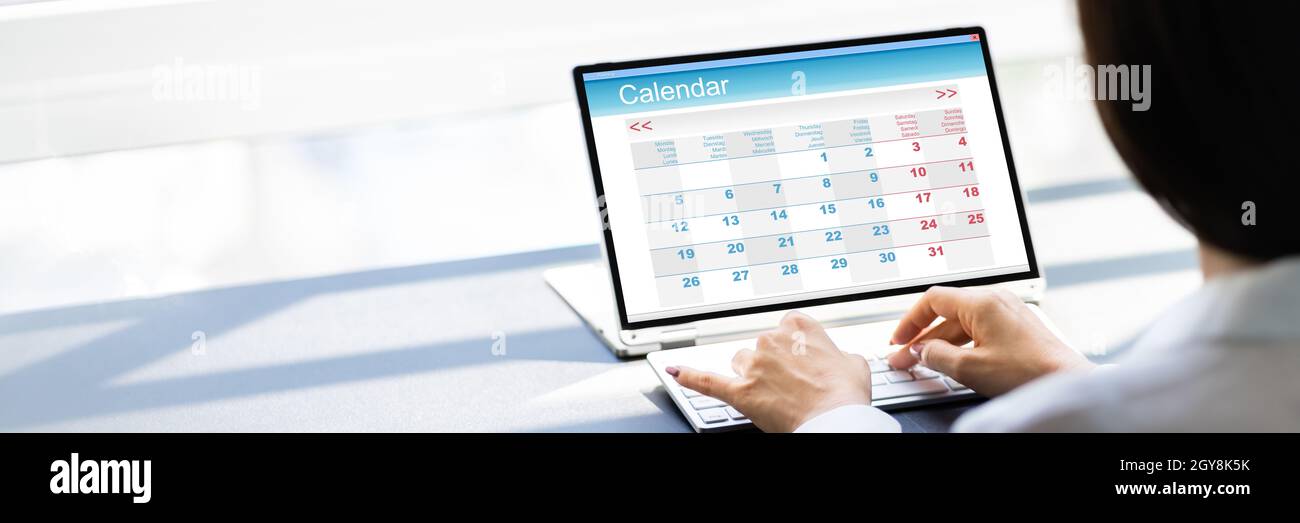 Executive Arranging Week Agenda In Calendar On Hybrid Tablet Stock ...