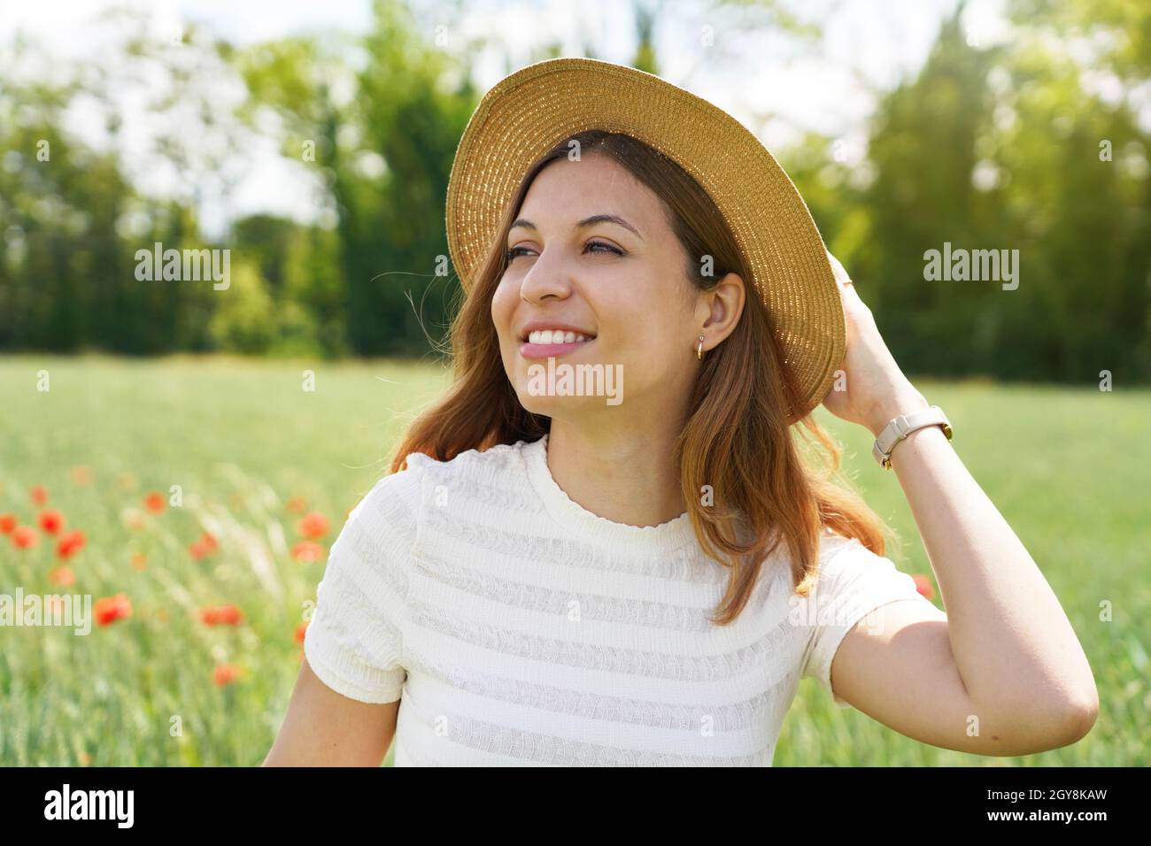 Restoring herself to nature after pandemic. Young woman breathing and ... Restoring herself to nature after pandemic. Young woman breathing and ...