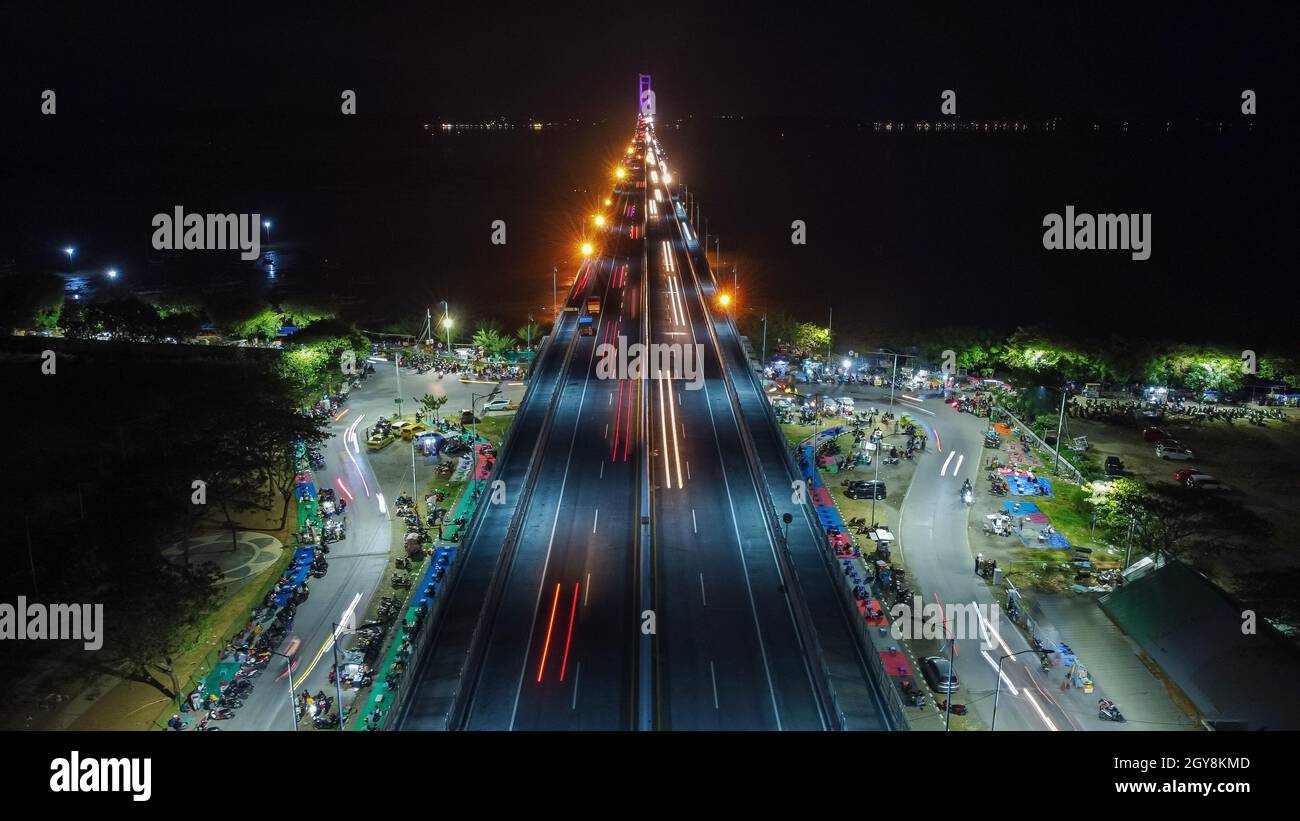 Aerial view of the Suramadu bridge illuminated at night Stock Photo - Alamy