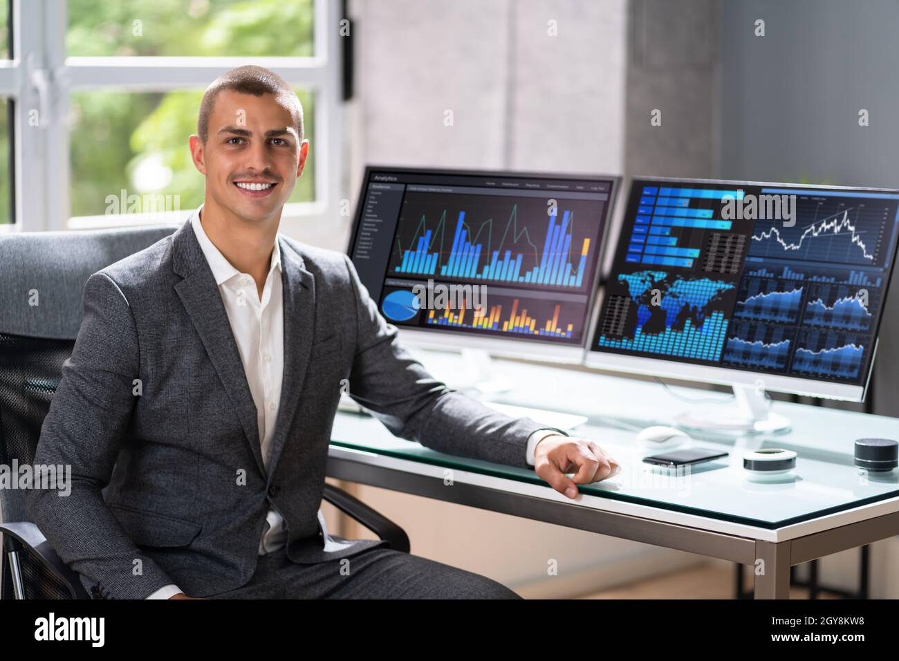 Analyst Man Using Business Data Analytics Dashboard Stock Photo - Alamy