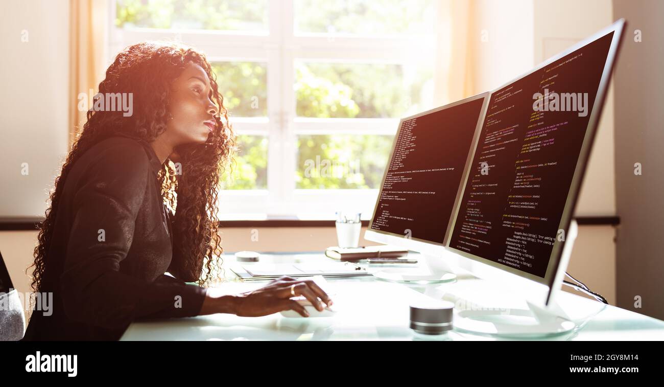 African American Woman Programmer. Girl Coding On Computer Stock Photo ...