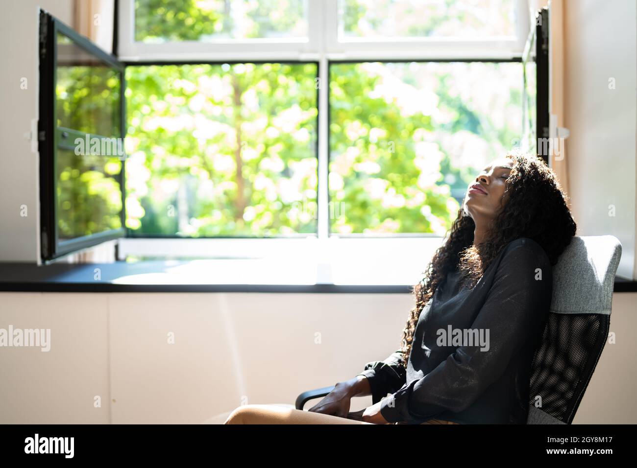 Open Office Window. Breathing Fresh Air And Relaxing Stock Photo - Alamy