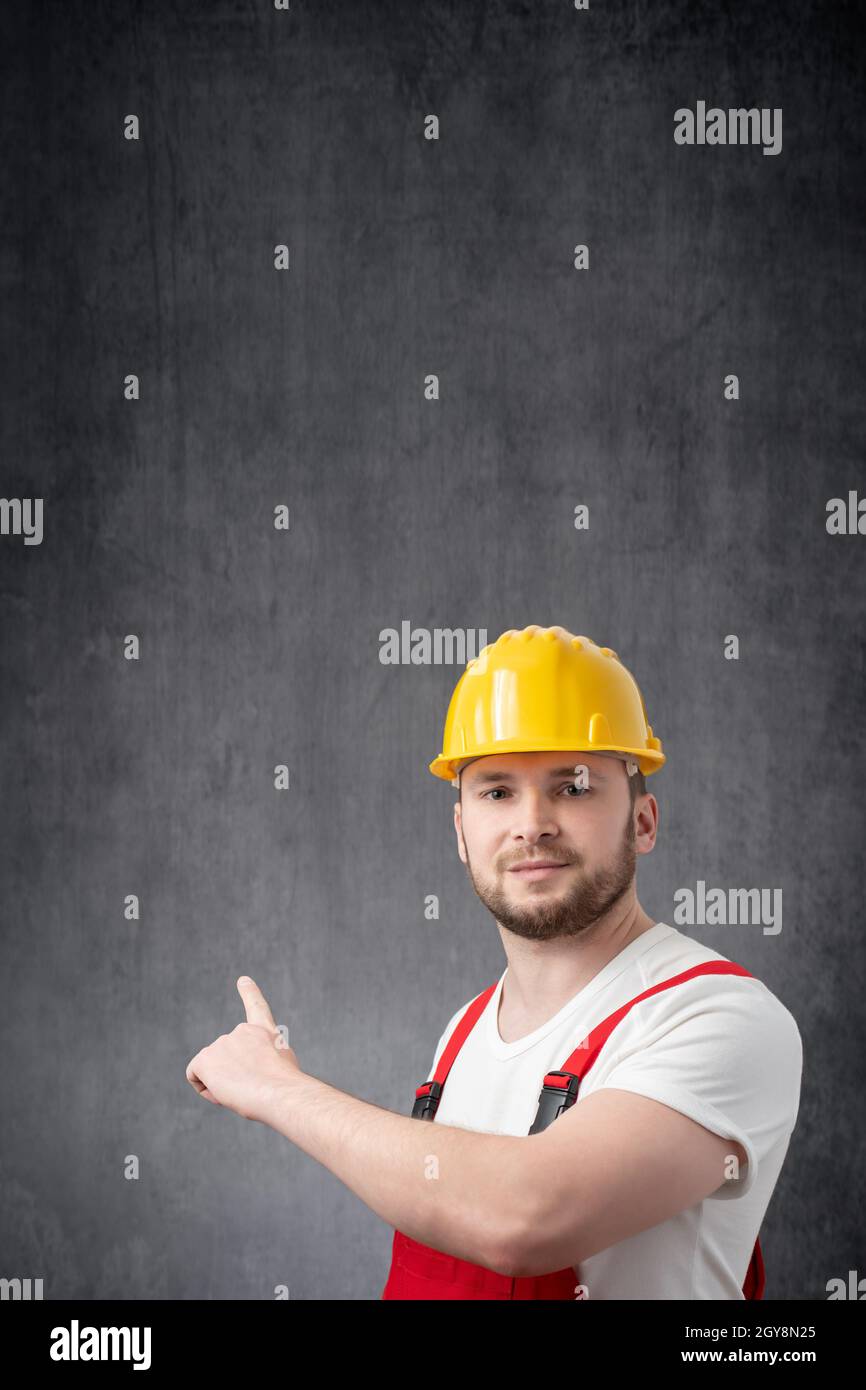 Construction worker pointing hi-res stock photography and images - Alamy
