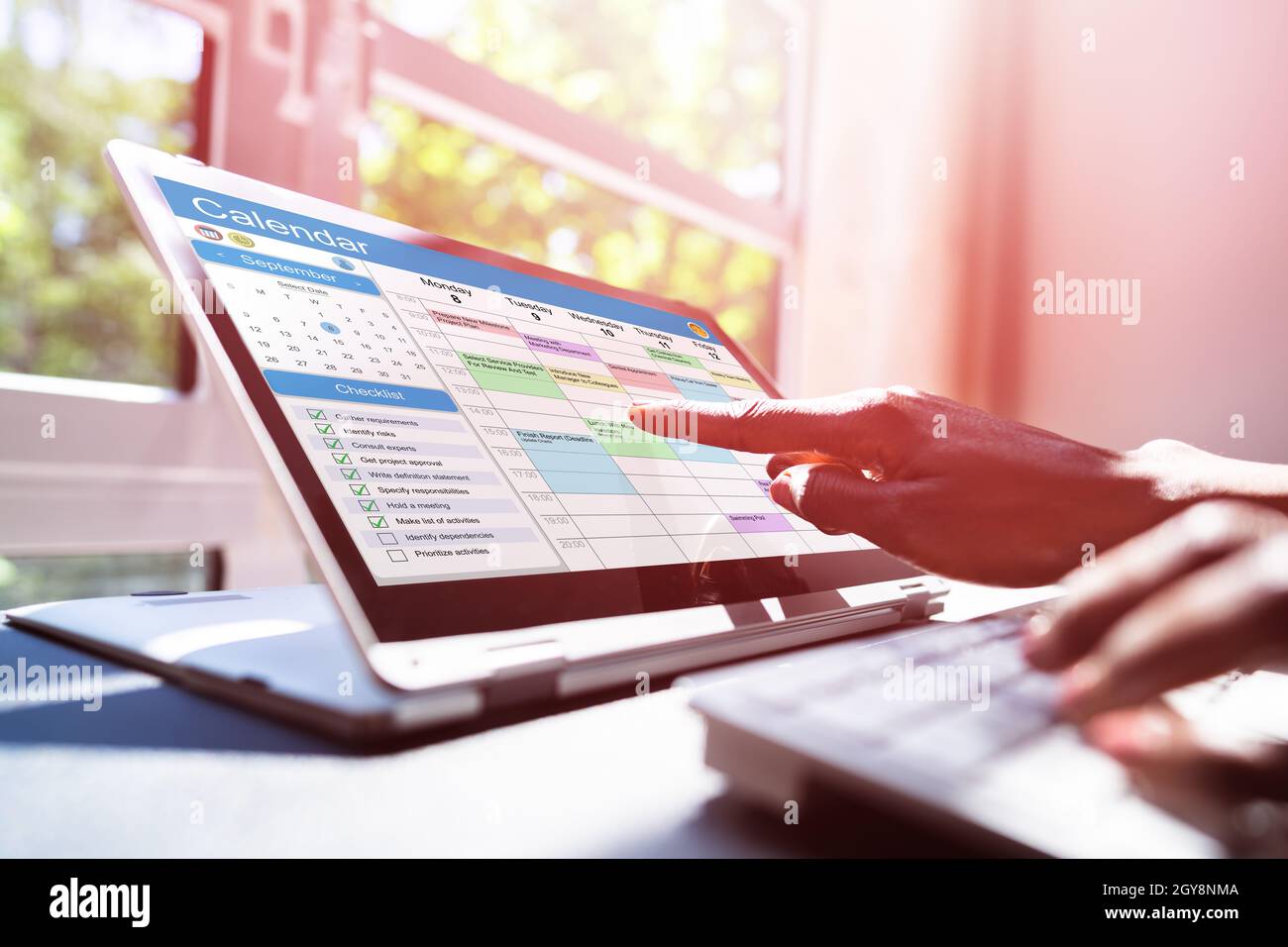 Hybrid Tablet Digital Agenda And Week Calendar Stock Photo - Alamy