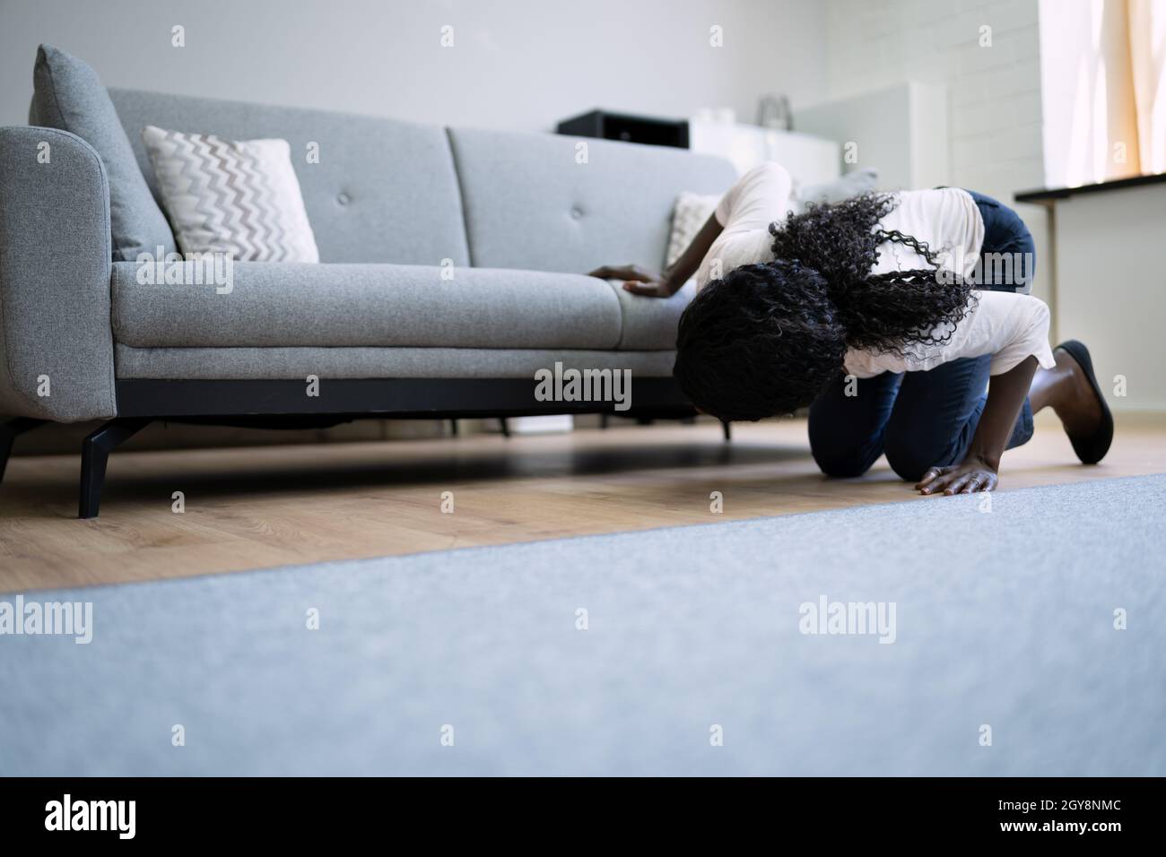 Woman finding keys hi-res stock photography and images - Alamy