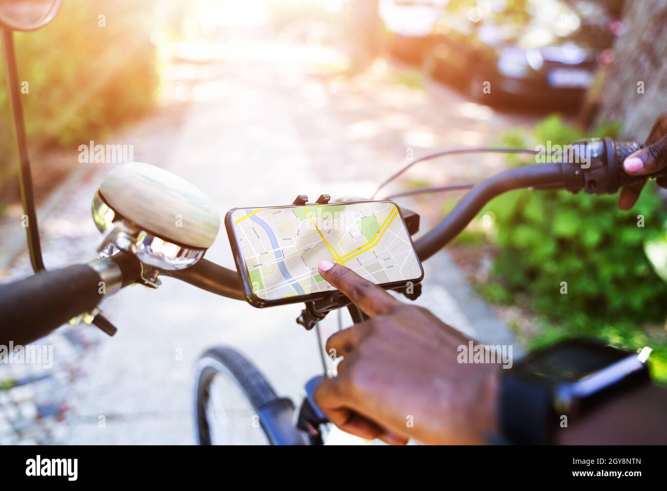 Bicycle GPS Navigator App With Map On Mobile Phone Stock Photo - Alamy