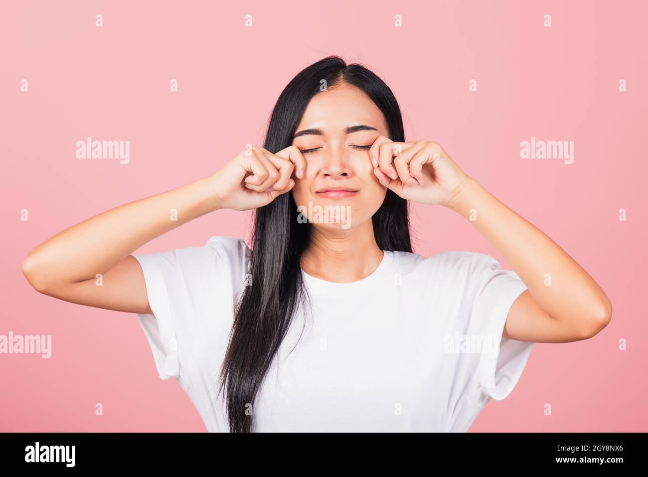 Asian portrait beautiful cute young woman bad mood her cry wipe tears ...