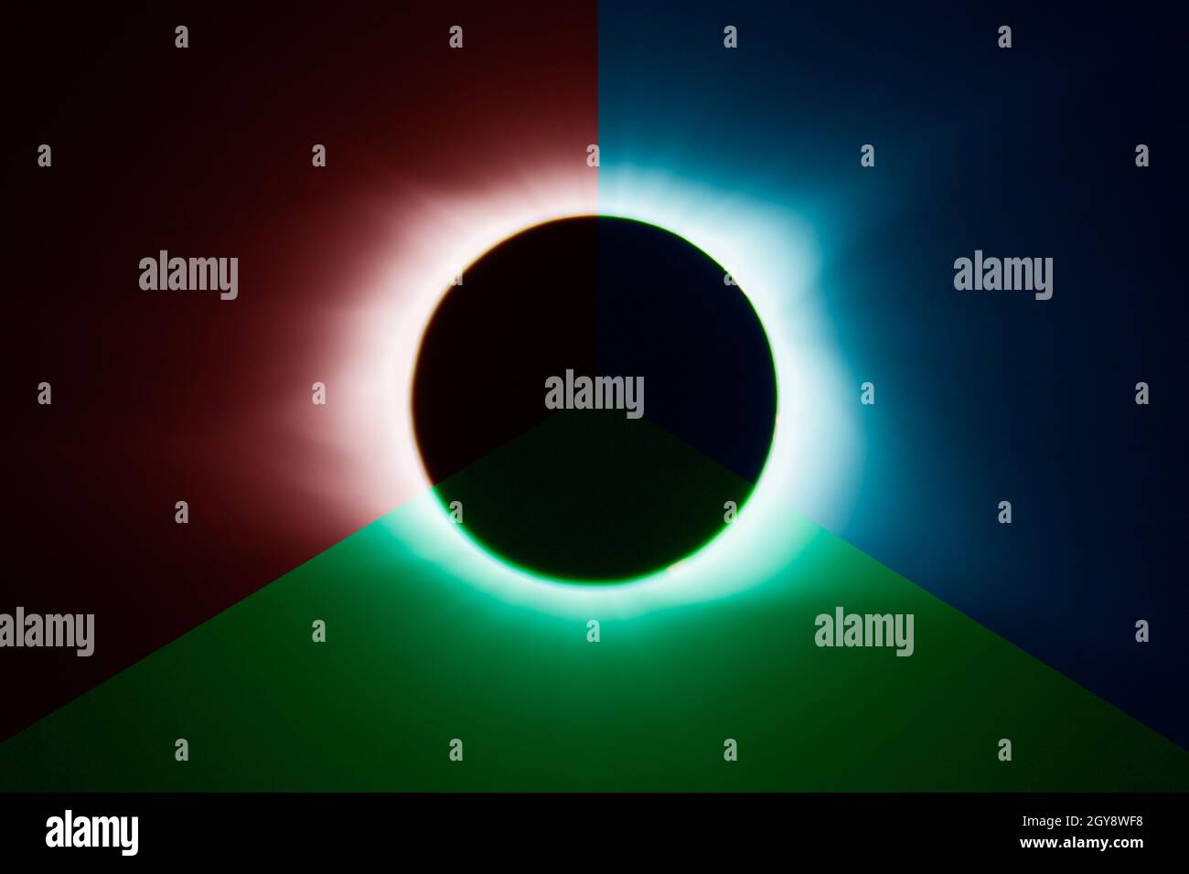 Solar eclipse with circle of black and red, blue and green colors added ...