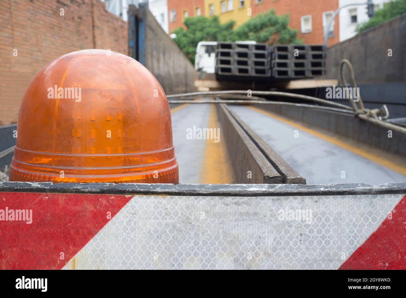 Building materials truck loaded with steel beams. Oversize load length ...