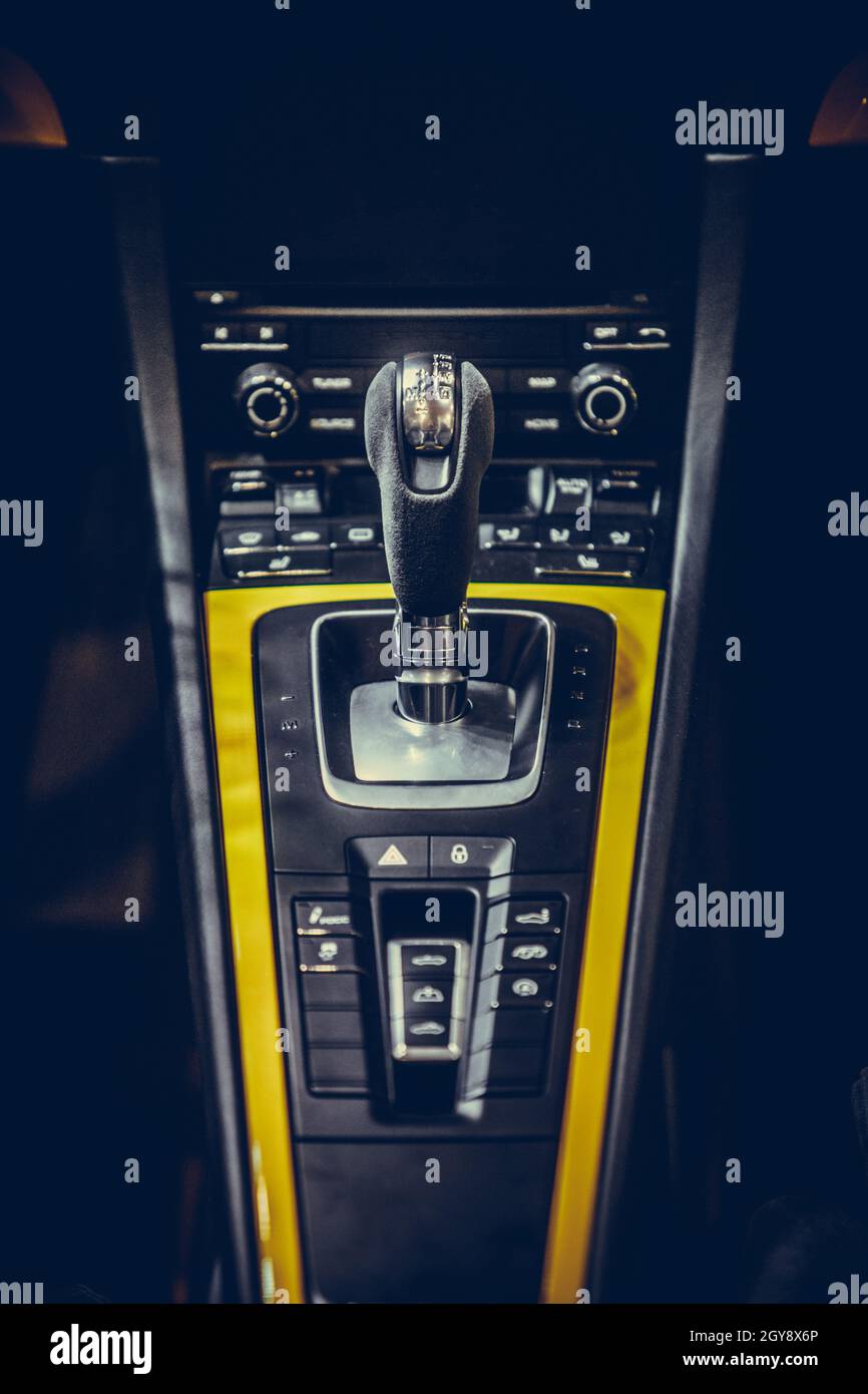 Close up shot of a new sport car gear shifter Stock Photo - Alamy