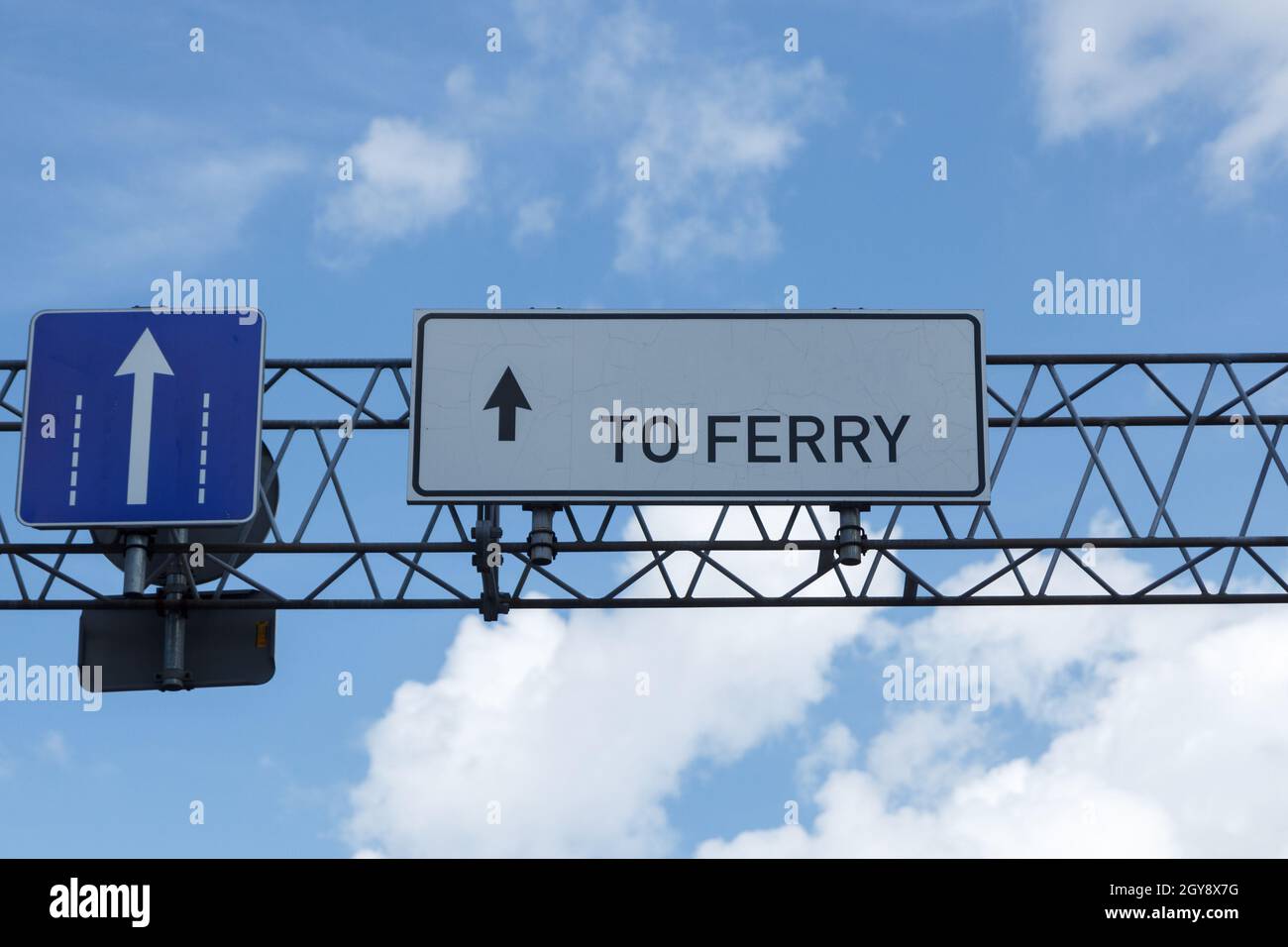 to ferry sign over blue sky. port entrance Stock Photo - Alamy