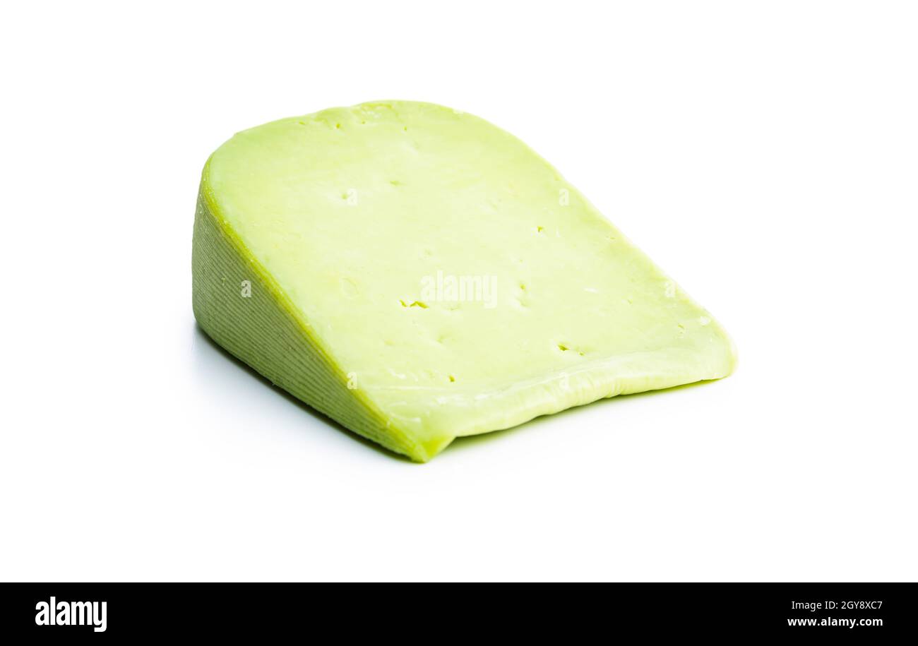 Block of hard cheese with wasabi flavor isolated on white background ...