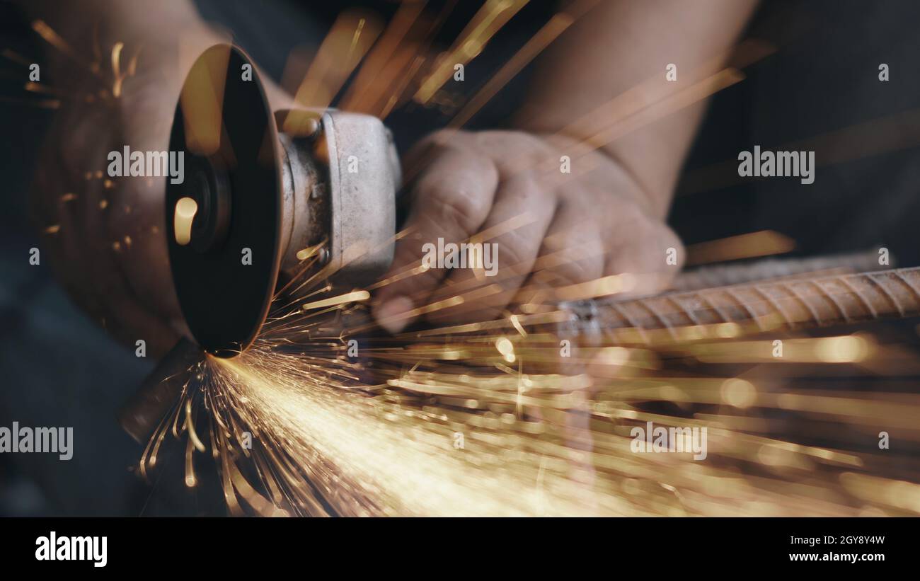 Mechanic using grinding machine on hi-res stock photography and images ...