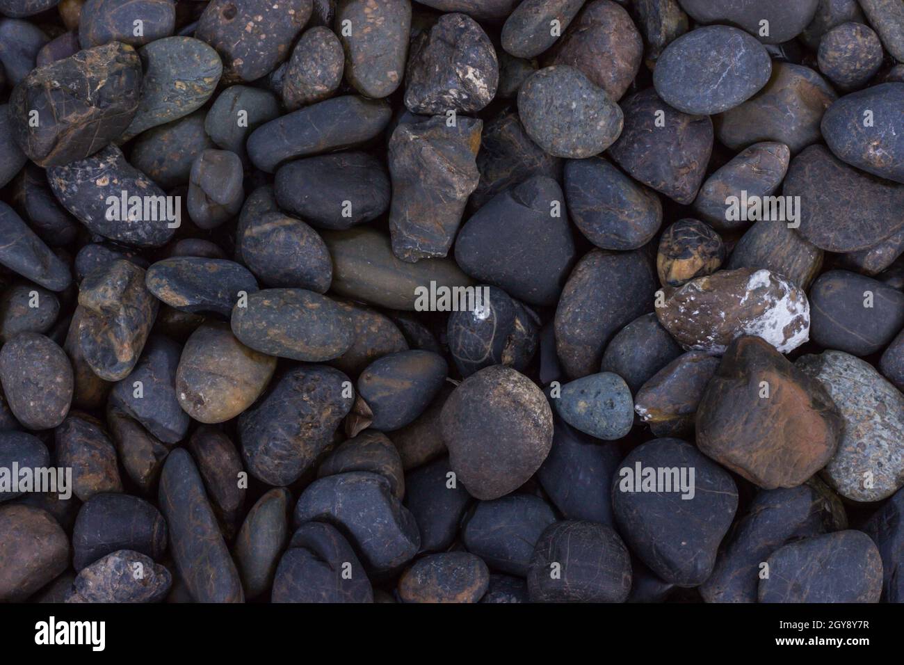 River stone for decoration in the garden and home. Texture background ...