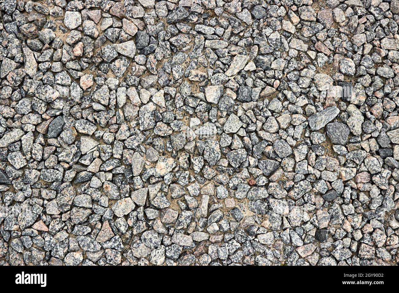 Pebbles concrete stone background hi-res stock photography and images ...