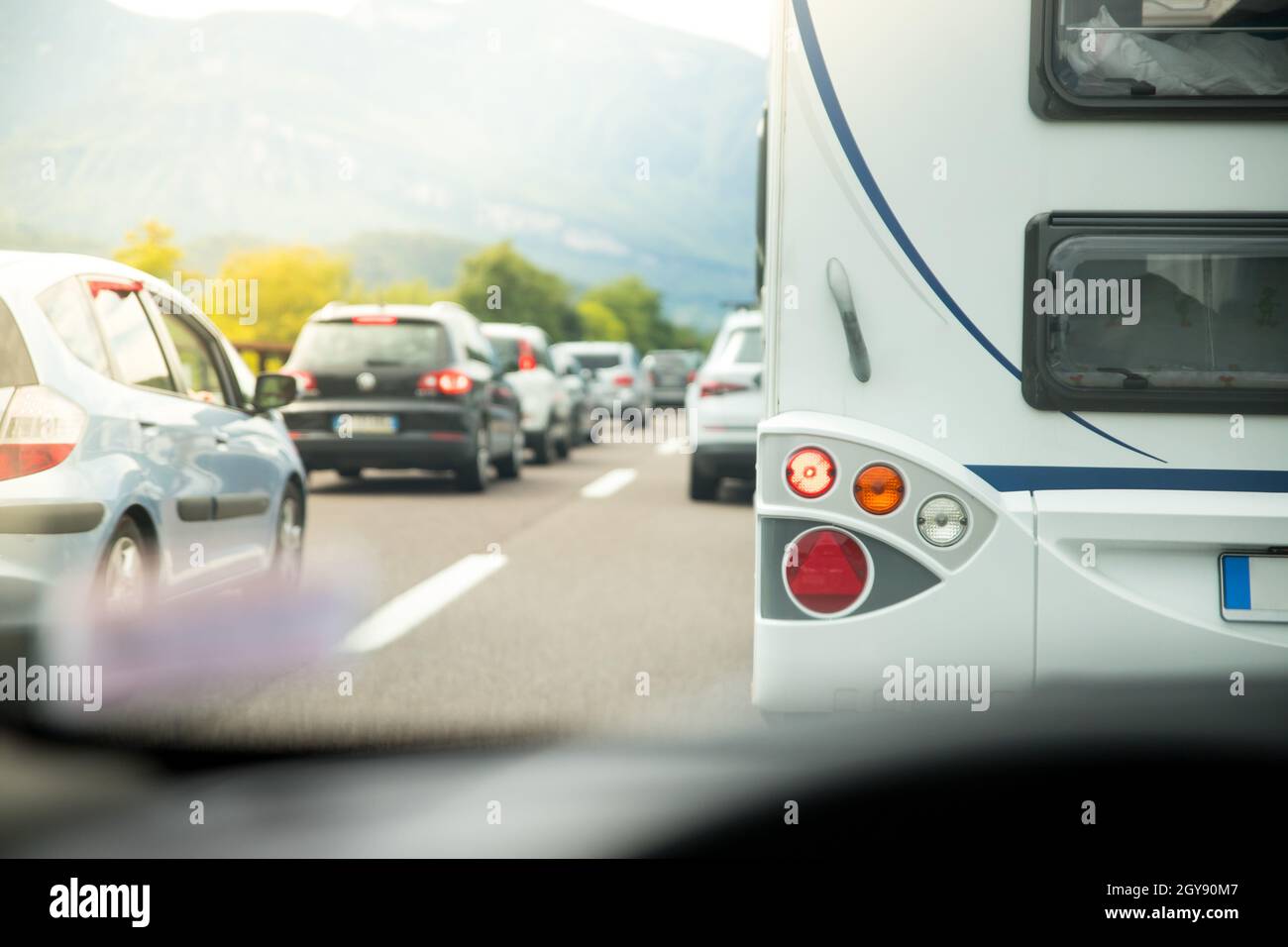 Cars on a highway, traffic jam in summer season Stock Photo - Alamy